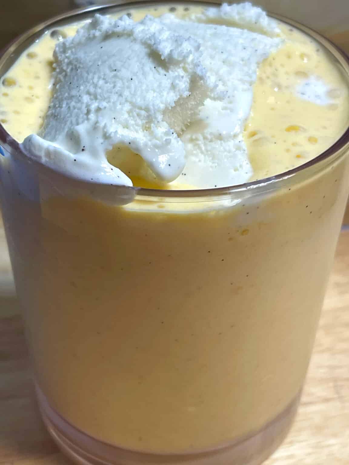 Mango Vanilla Milkshake With Ice Cream And Ripe Mangoes